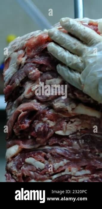 Raw doner, cutting hanging doner, turkish street delicacies, snacks ...