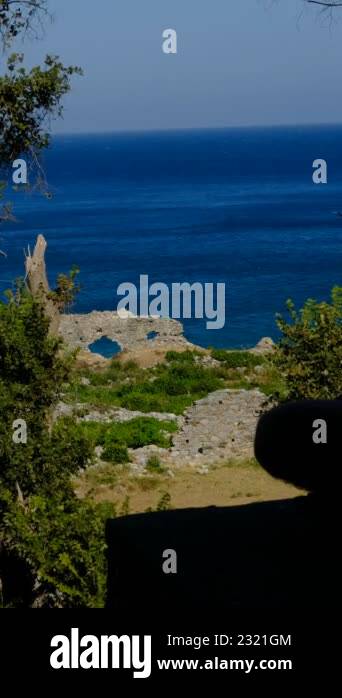 Silhouette teenager watching sea videos, outdoor sports activities ...