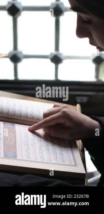 Islamic teachings, Muslim woman reading quran close-up , praying for ...