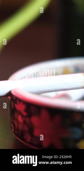 Close-up view of coffee and cigarette ashtray, coffee and cigarette ...