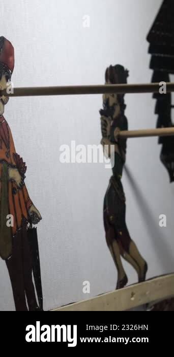 Traditional theater play performed using shadow play, curtain, light ...