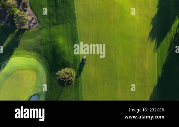 This video features a scenic aerial view of a beautiful golf course ...
