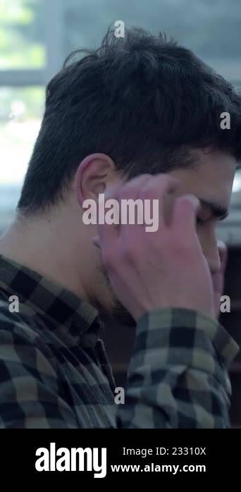 Close-up shot of a man standing in the masjid starting the prayer ...