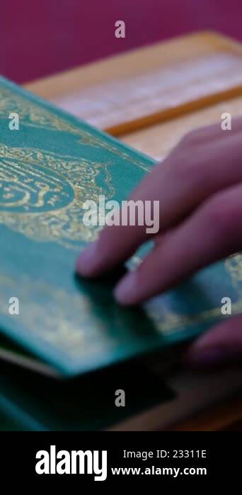 View of opening the pages of the religious book quran lying on the ...