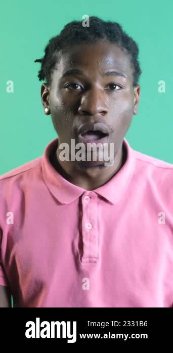 Black man making sad surprised, male model mimics who were very ...