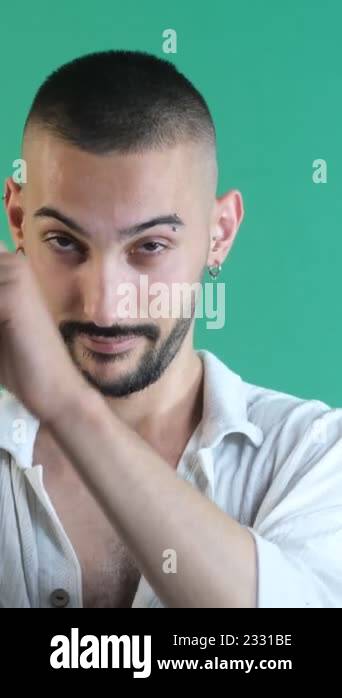 Young Man Pointing To Corner, man pointing right corner with both hands ...