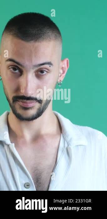 Man pointing with ones finger, show the top corner of the screen with ...