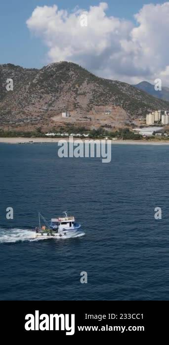 Fishing boat, fishing boat traveling close to shore, fishing boat ...