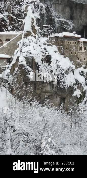 Drone view of Sumela monastery under the snow, historical monastery ...