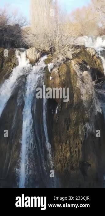 Drone view of natural water source Muradiye waterfall, water flow in ...