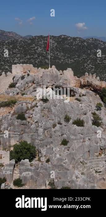 The ancient castle of Simena built on the hill, drone view of the ruins ...