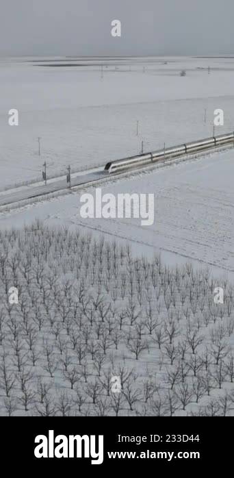 Drone view of the high speed train pass in railway and station points ...