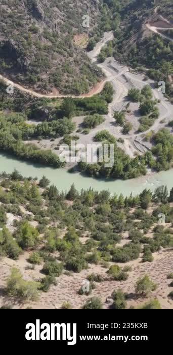 Meandering River Road, curvy stream bed in canyon valley, wild beauty ...