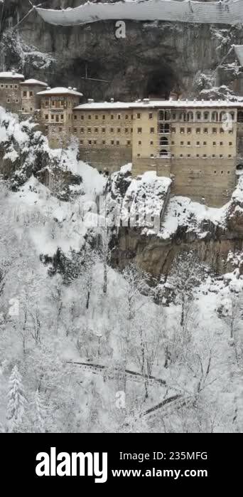 Drone view of Sumela monastery under the snow, historical monastery ...