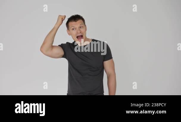 Excited man smiles stupidly and hits head. Emotions grimaces fool Stock ...