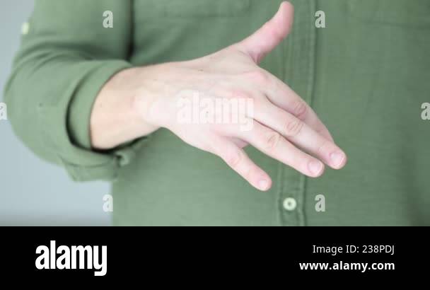 Demonstration of hand gestures in communication techniques or exercises ...