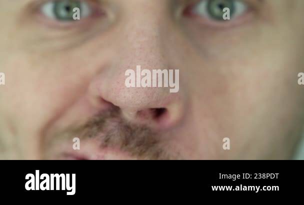 Man showing close up facial expression with stubble with detailed ...