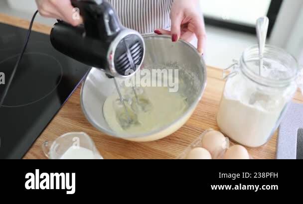 Mixing dough and the process of making a delicious treat or dessert ...