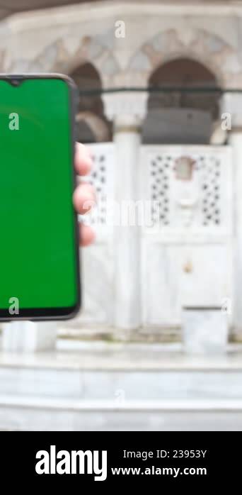 Phone application in the courtyard of the mosque, advertisement on the ...