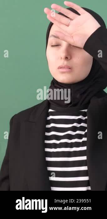 Hijab girl Tired, girl be overwhelmed, hand on head young person ...