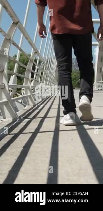 Image of mans feet crossing the bridge, image of walking step by step ...