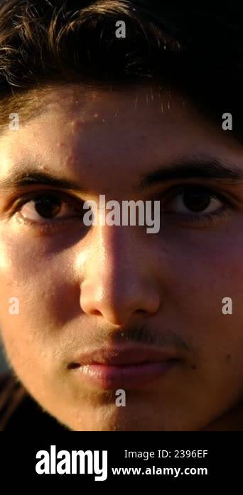 Young man looking at the camera, young mans portrait, different human ...