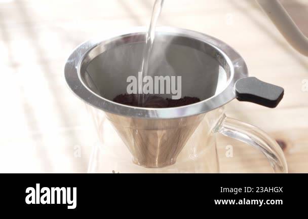 Drip coffee - Scene of pouring hot water and dripping Stock Video ...