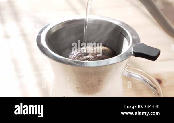 Drip coffee - Scene of pouring hot water and dripping Stock Video ...