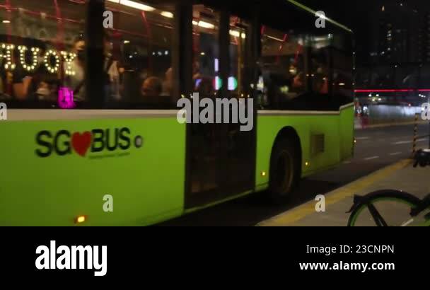 Singapore 1 june 2023: Singapore public transportation bus at night time . High quality 4k ...