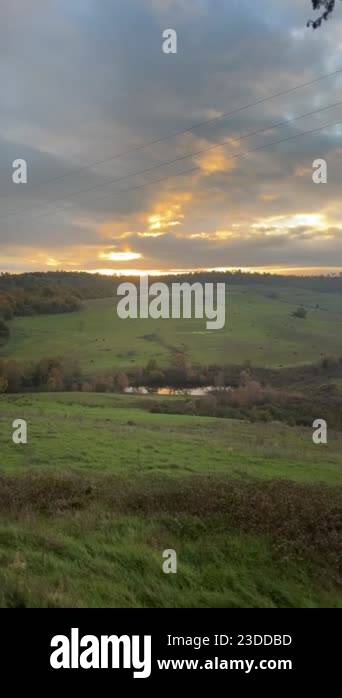 Autumnal countryside in Tuscany with rolling hills, hay bales, and a ...