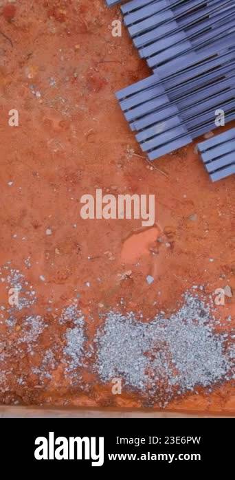Various construction materials are scattered on construction site ...
