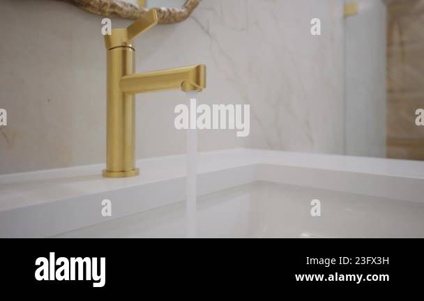 Man hand open and closed the water tap to save water. Turning on and ...