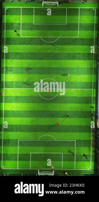 Aerial view of a football match, soccer. Football field and Footballers ...