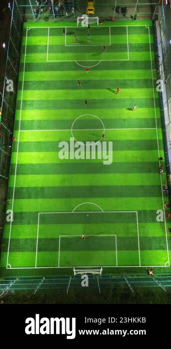 Aerial view of a football match, soccer. Football field and Footballers ...
