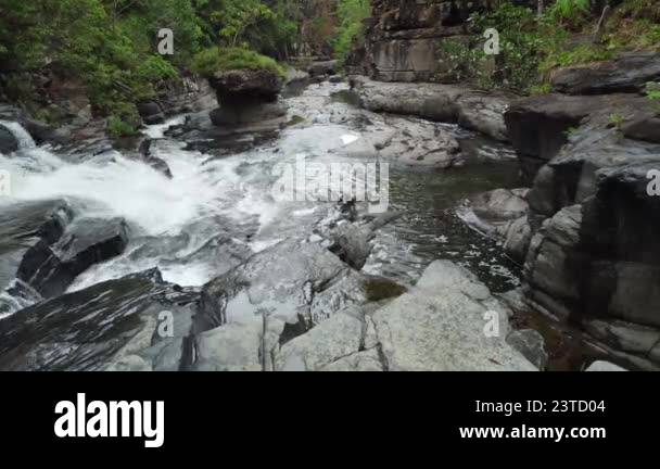 River cutting trough black rocks on the Brazilian Cerrado in Chapada ...