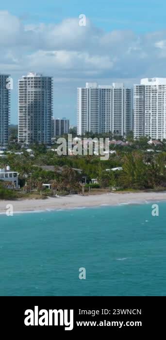 Discover a stunning aerial view of Miami Beach with its vibrant skyline ...