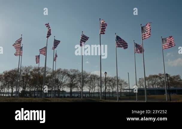 A magnificent and stunning array of American flags is waving proudly ...