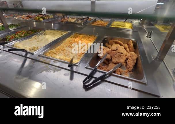 An enticing and vibrant buffet display that features an impressive ...