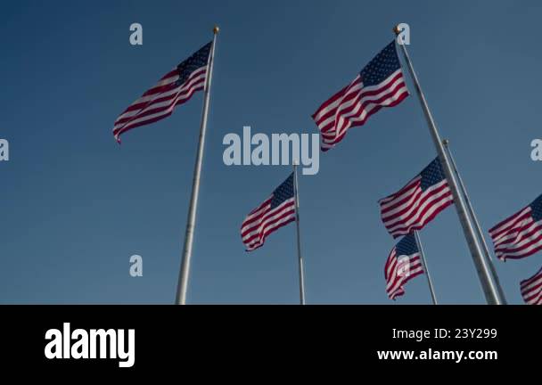 A magnificent and stunning array of American flags is waving proudly ...