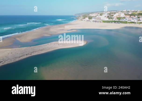 Over the blue coast of the Atlantic Ocean. Below is a bay and a ...
