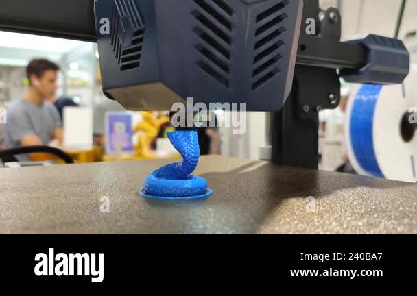 The process of printing on a 3D printer. 3D printer printing object from molten plastic close-up ...