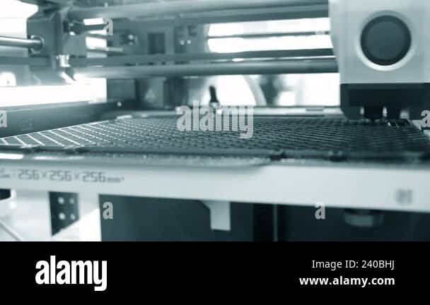 The process of printing on a 3D printer. 3D printer printing object from molten plastic close-up ...