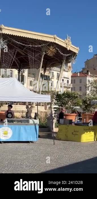 Marche Forville Provencal Market and Old Town tourists man with bicycle ...