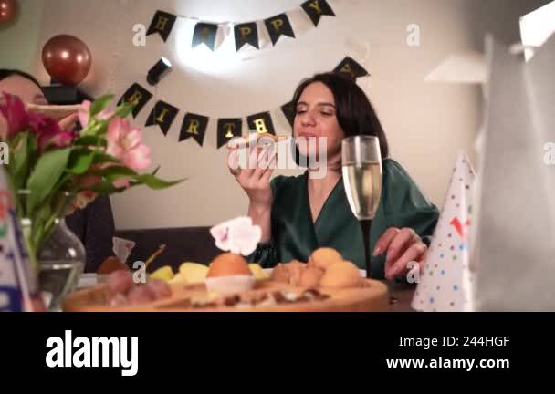 A quiet cozy evening with friends celebrating a birthday. The process ...