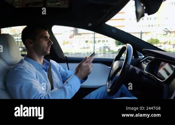 Male businessperson have serious telephone conversation while riding an ...