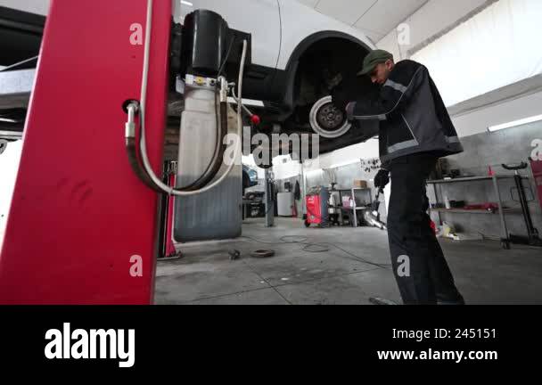 Mechanic in uniform cap Stock Videos & Footage - HD and 4K Video Clips ...