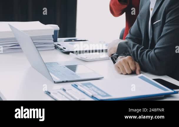 businessman with financial report in the office, closeup Stock Video ...