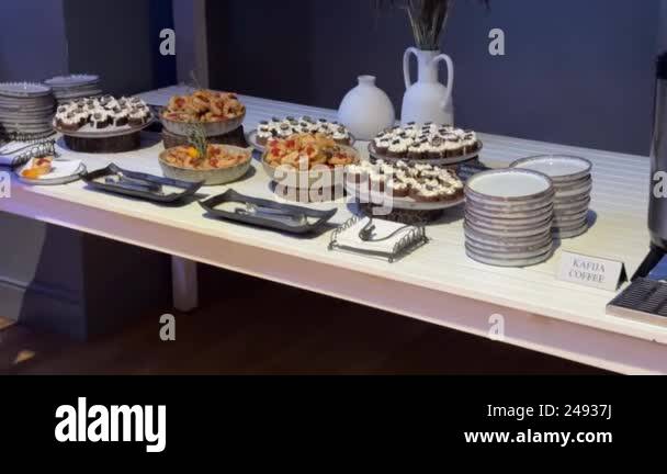 Valmiera, Latvia - October 18, 2024 - Dessert table with an assortment ...