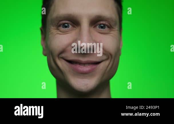 The young man smiles. Portrait of male who happy about something ...