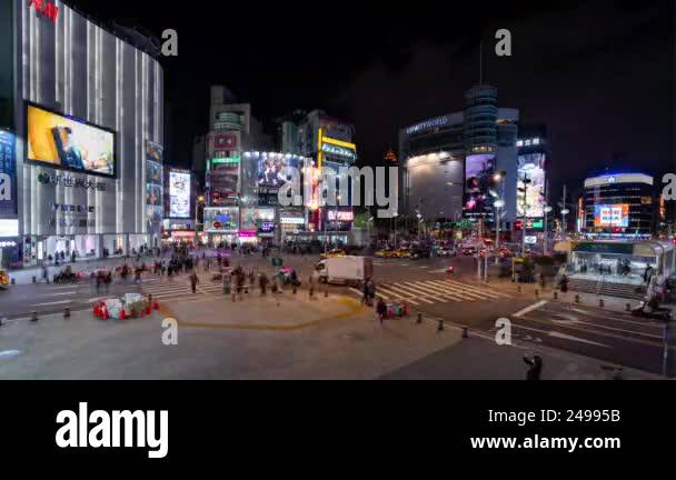 Night time lapse clip from a busy intersection at Ximen street in ...